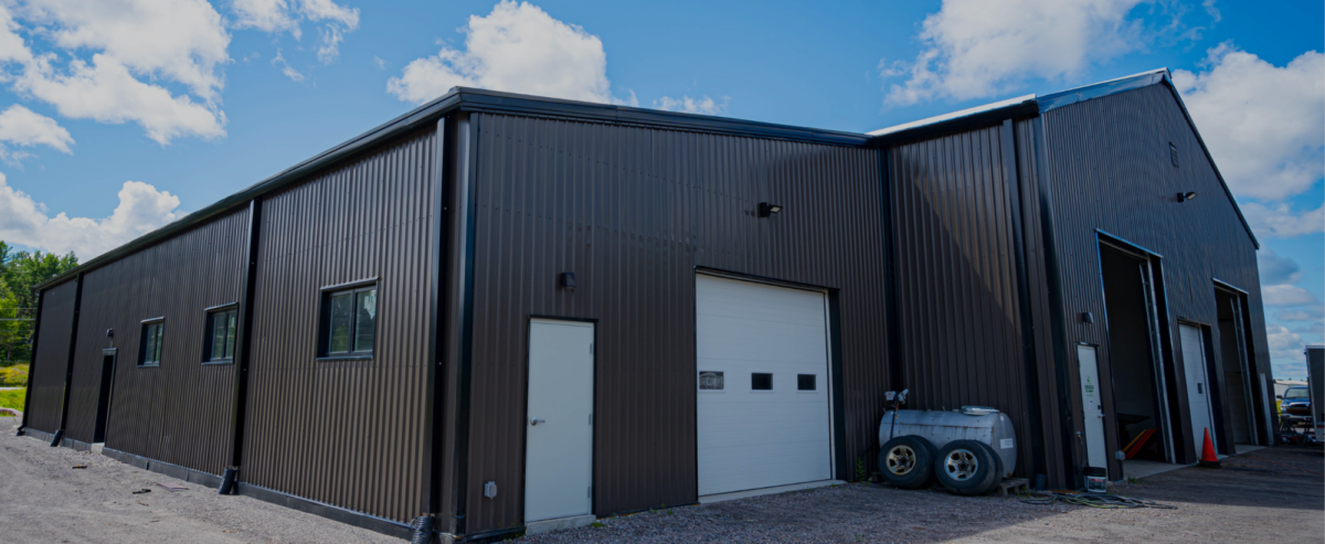 Warehouse Buildings - Red Iron Steel - Kodiak Steel Buildings